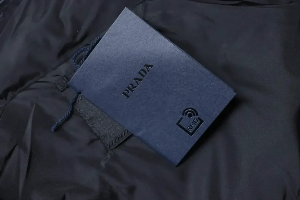 Down Jacket With Quilted Stand-Up Collar And Triangular Logo Pocket ...